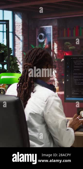 Vertical video Admin uses computer for artificial intelligence computing simulation, waiting for ...