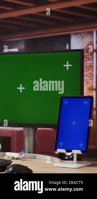 Vertical video Remote employee in home office using green screen PC and ...