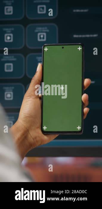 Vertical video Woman using isolated screen smartphone and AI LLM chatbot on computer screen in ...