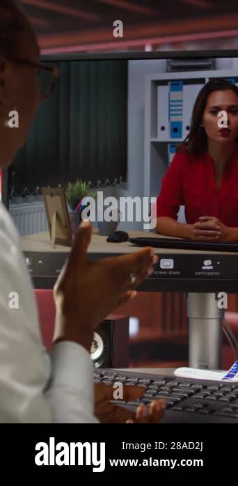 Vertical video Remote employee in teleconference meeting with manager ...