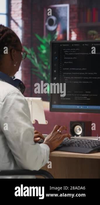 Vertical video Admin uses computer for artificial intelligence computing simulation, waiting for ...