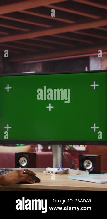 Vertical video Teleworker using green screen PC in home office to write ...