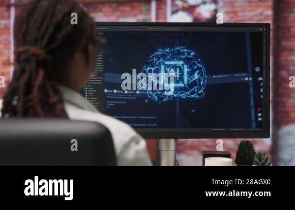 Programmer using computer at home for artificial intelligence computing simulating human brain ...