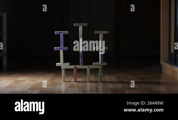 shooting to the wooden blocks in the room with their demolition Stock ...