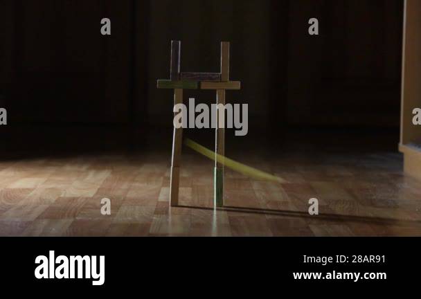 shooting to the wooden blocks in the room with their demolition Stock ...