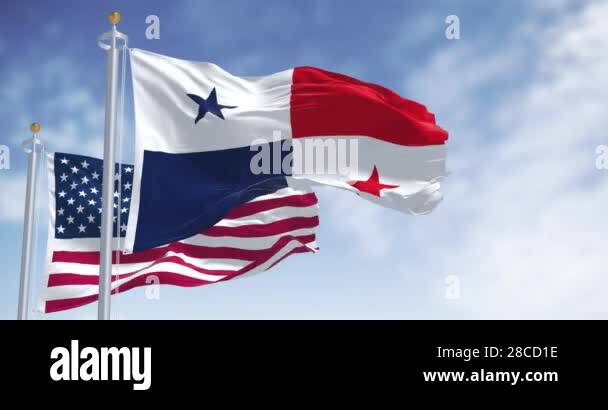 National flags of Panama and the The US waving in the wind on a clear ...