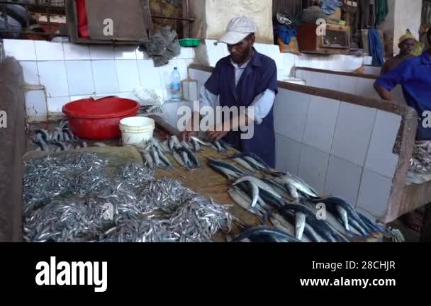 Zanzibar, Tanzania - november 03, 2019 : African men prepare and sell ...