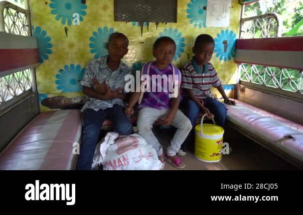 Zanzibar, Tanzania - november 03, 2019 : Happy african children ride ...