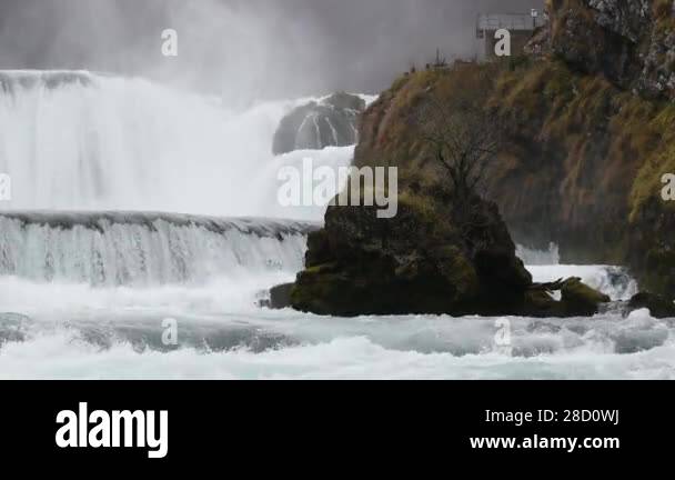 Strbacki buk waterfall on Una river rich in water, rock in water and ...