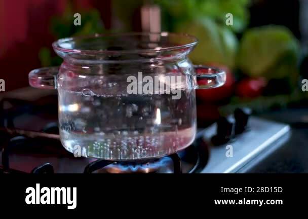 Bubbles Of Boiling Water In Pot. Hot Water Cooking Cookware On Stove ...