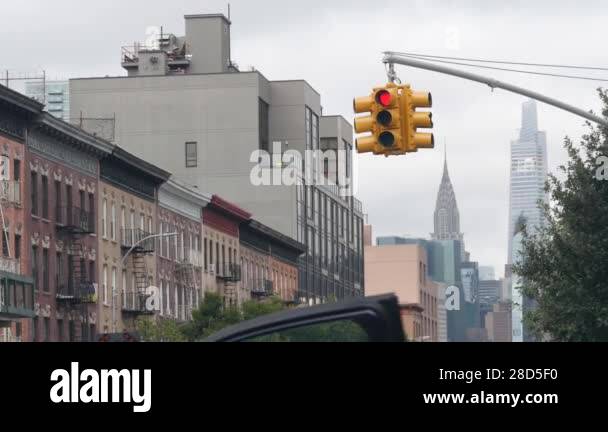 New York City street crossroad, yellow traffic light, transport road ...