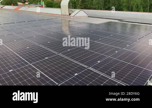 Vast Solar Panel Installation Covering the Metal Roof of a Large Industrial Facility Stock Video ...