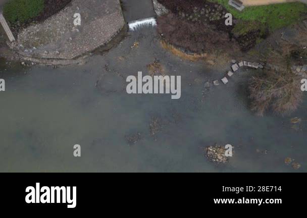 newly created natural embankment by river. benches, terraces, relaxed ...