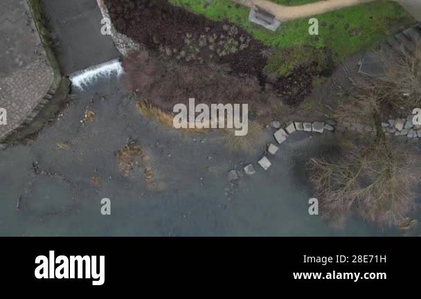 newly created natural embankment by river. benches, terraces, relaxed ...