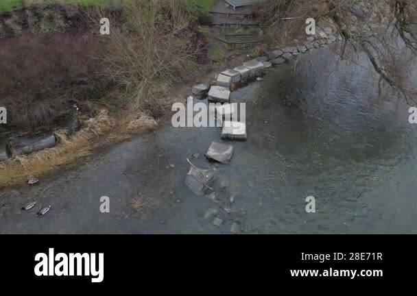 newly created natural embankment by river. benches, terraces, relaxed ...