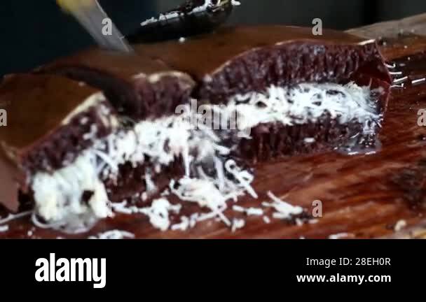 Asian Indonesia man hand cooking street food terang bulan with nuts ...