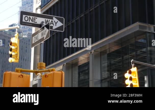 New York City street crossroad, yellow traffic light, oneway transport ...