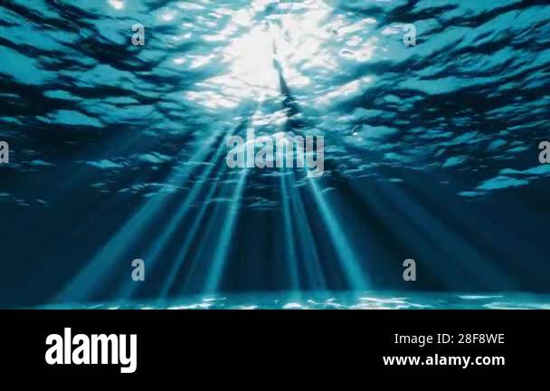 A serene underwater scene showcasing vibrant light rays gracefully ...