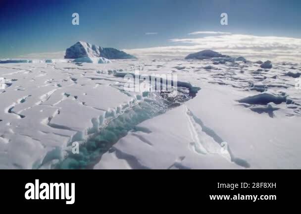 A breathtakingly beautiful view of an icy polar landscape featuring ...