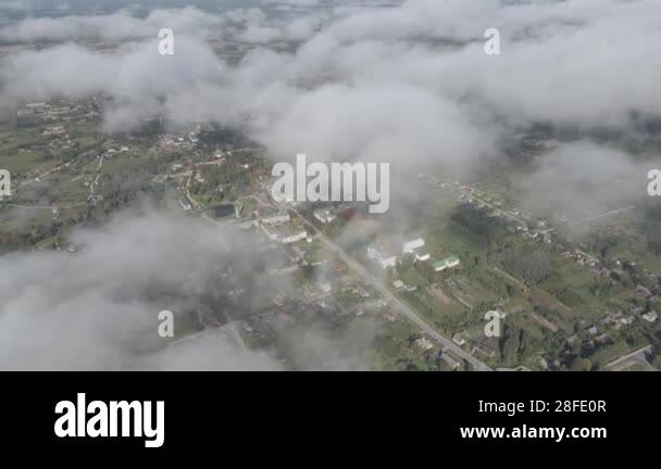 Aerial perspective of a rural town with residential buildings, white ...