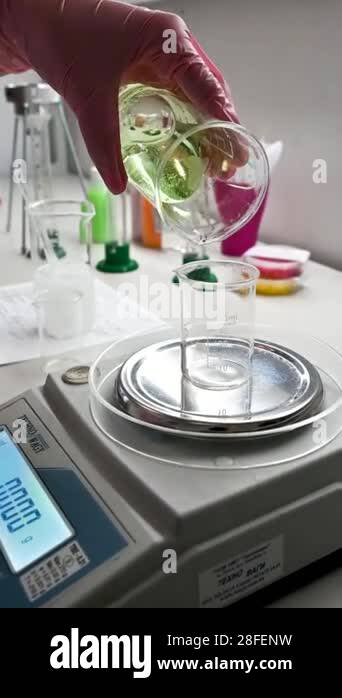 cosmetic laboratory with chemical analysis and testing equipment. High ...