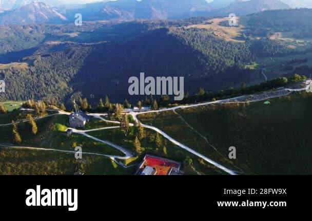 An aerial view of the Austrian Alps features expansive mountain ranges ...