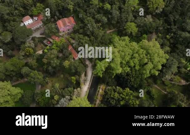 An aerial perspective of Sintra, Portugal, reveals red roofed buildings ...
