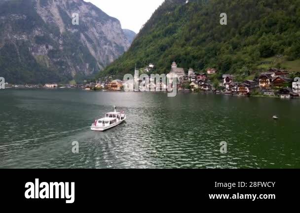Hallstatt village in Austria features traditional architecture and a ...