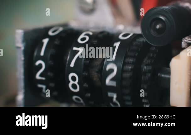 Close-up of a mechanical counters rotating digits. The macro view ...