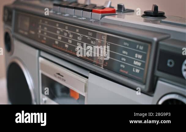 Close-up on a classic radio dial, with a needle moving across ...