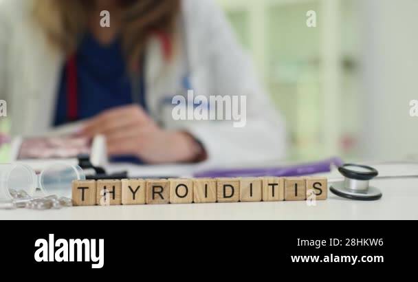A healthcare professional examines thyroiditis, focusing on patient ...