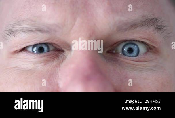 A closeup shot capturing the allure of bright blue eyes and the ...