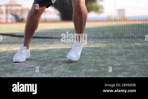 An impressive athlete shows great strength and agility while performing ...