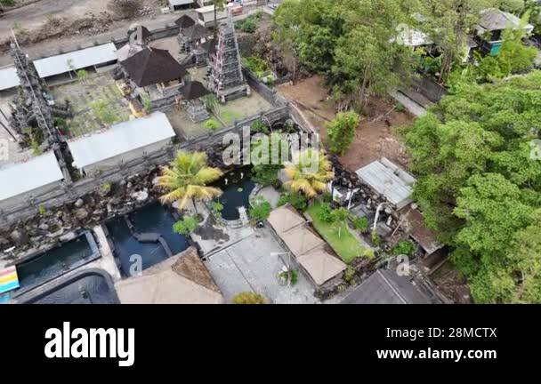 Drone aerial footage of hindu Temple near batur hot spring, Bali island ...