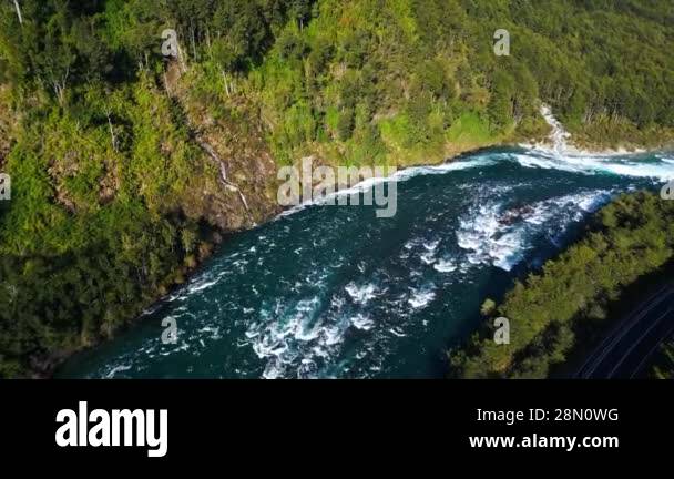 Witness the breathtaking beauty of river rapids winding through a ...