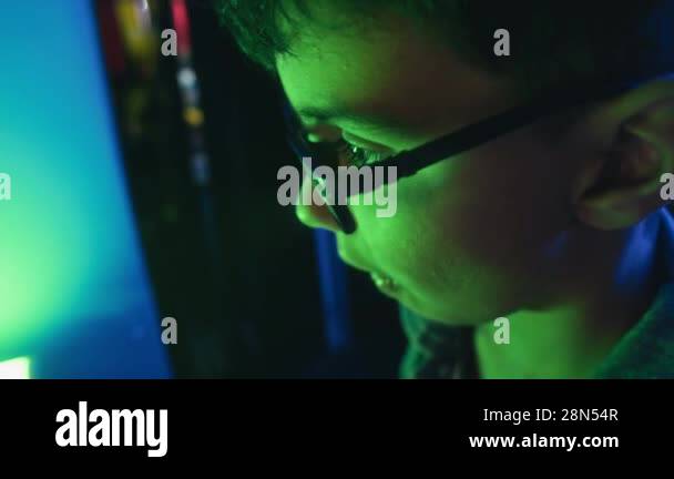 High-angle extreme closeup of face of focused young Indian or Middle ...