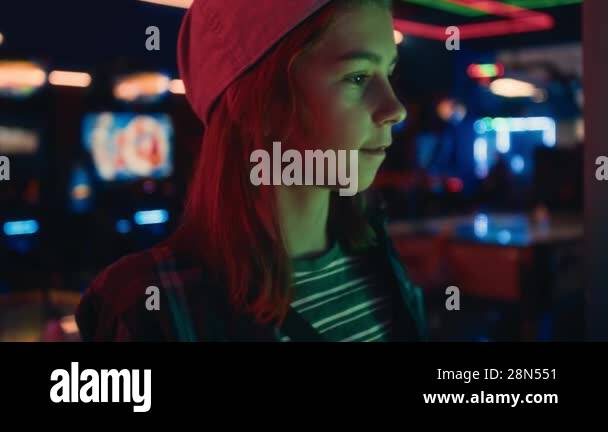 Closeup of face of focused teenage polyethnic boy in baseball cap ...