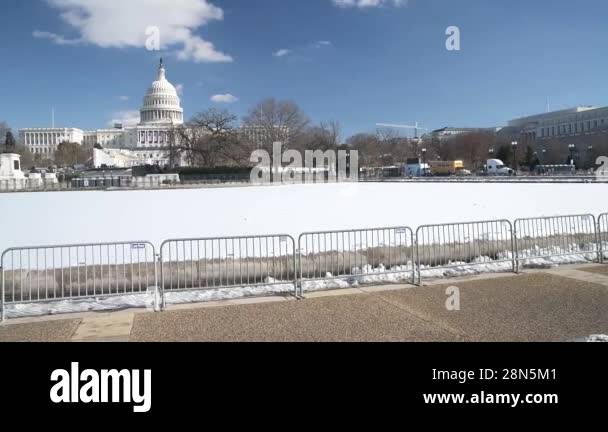 fencing around the US Capitol and police providing security before the ...