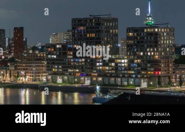 Panoramic aerial timelapse of Katendrecht peninsula at night and ...