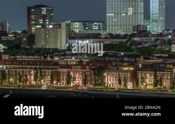 Panoramic aerial timelapse of Katendrecht peninsula at night and ...