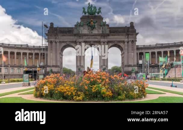 Timelapse of the Cinquantenaire Arcade in Jubelpark with flowerbed ...
