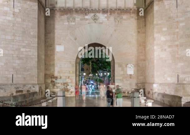 Arch entrance to Serrans Towers Torres de Serranos night timelapse in ...