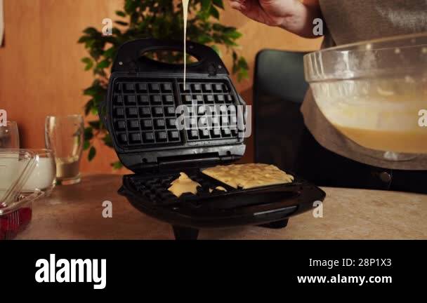 Home cooking daily routine. Woman sitting at the table at home in the ...