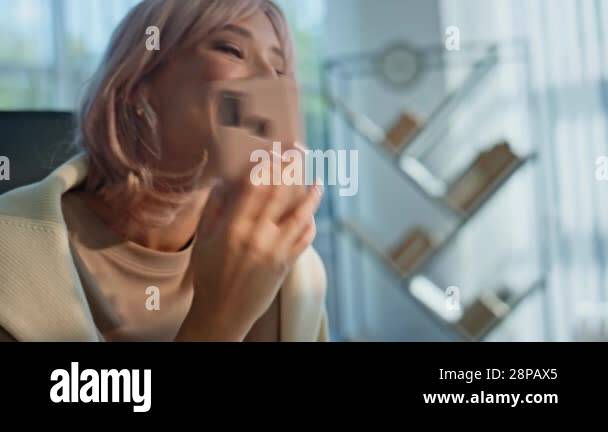 Smiling blonde woman manager speaking telephone having fun closeup ...