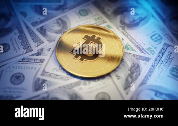 A gold Bitcoin token placed on a pile of U.S. dollar bills, symbolizing ...