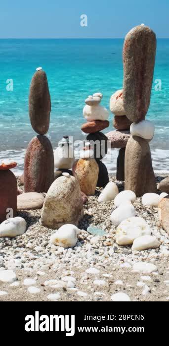 Concept of balance and harmony. Stones pebbles stacks on the beach ...