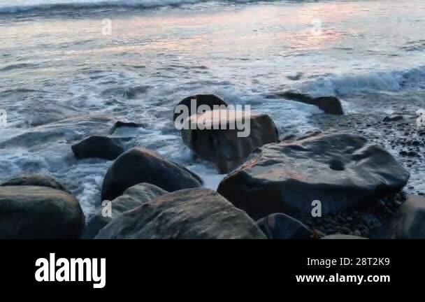 The cool Melted Rocks of Swamis Beach. Erosion control boulders put ...