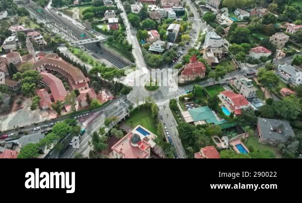 Aerial view of traffic on the roads of Barcelona. Public transport and ...