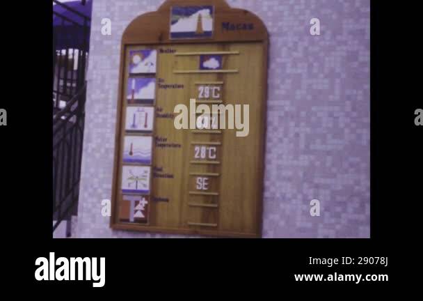 Hong kong, june 1985: wooden weather board displays macau's weather ...