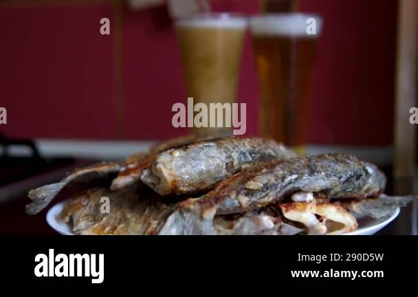 Frying fish in a frying pan. Tasty homemade roasted crucian carp Stock ...